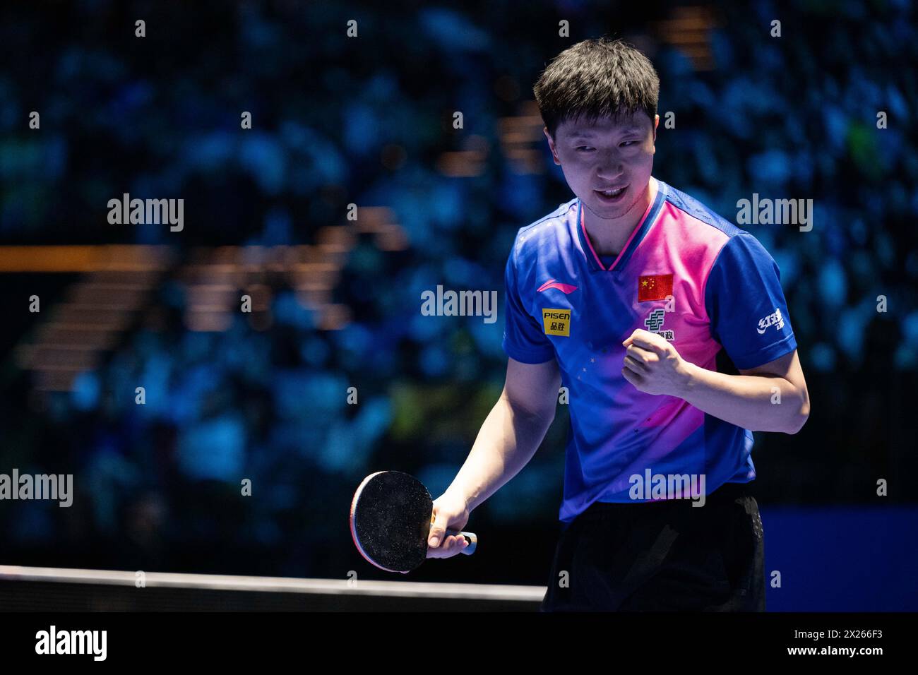 Macao, China. 20th Apr, 2024. Ma Long of China reacts during the men's ...