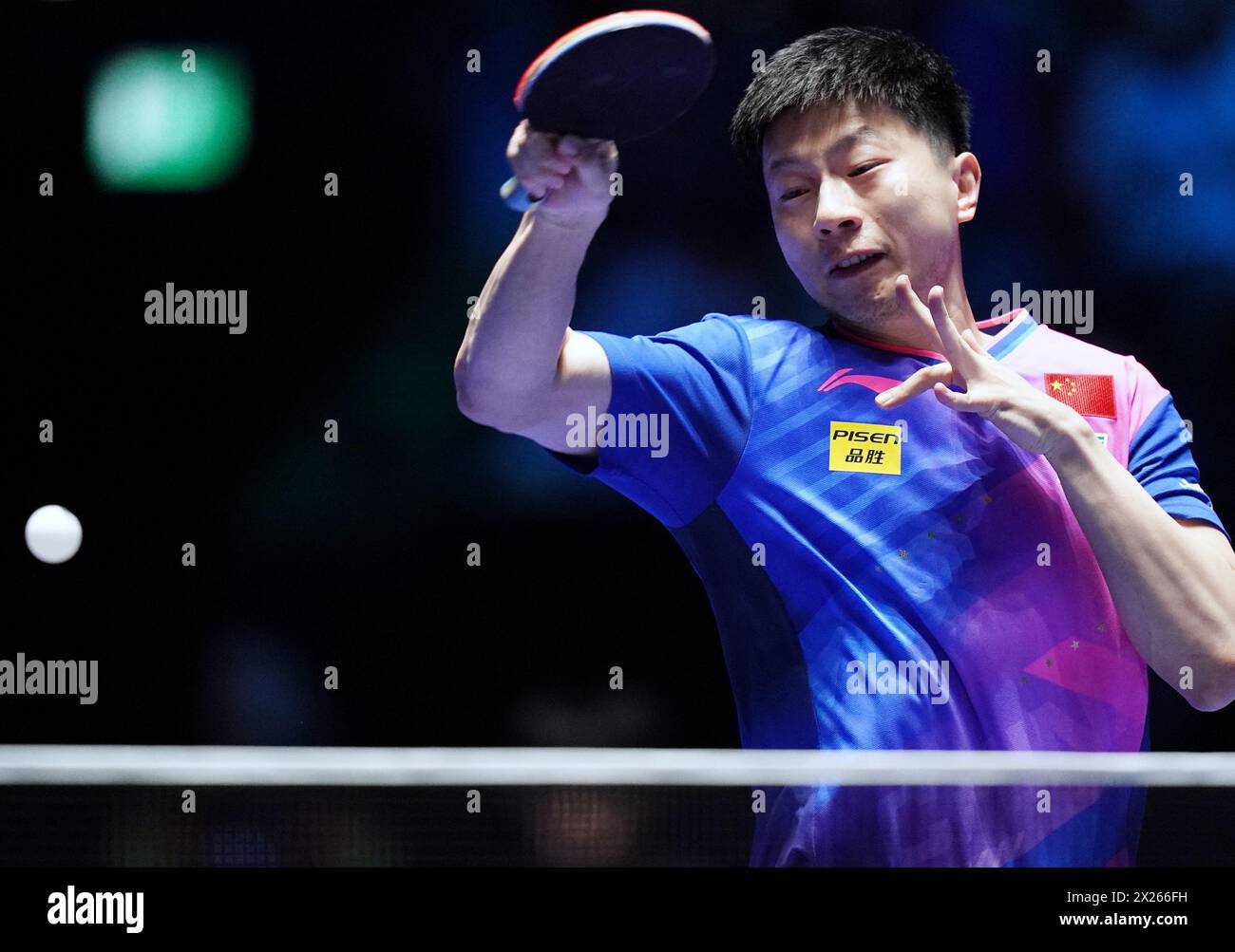 Macao, China. 20th Apr, 2024. Ma Long of China hits a return during the ...