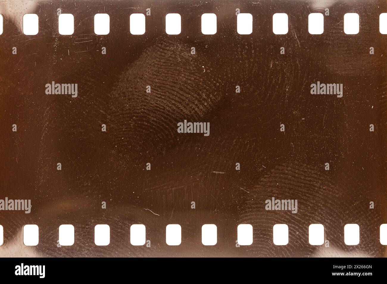 Dusty and grungy 35mm film texture or surface. Perforated scratched ...