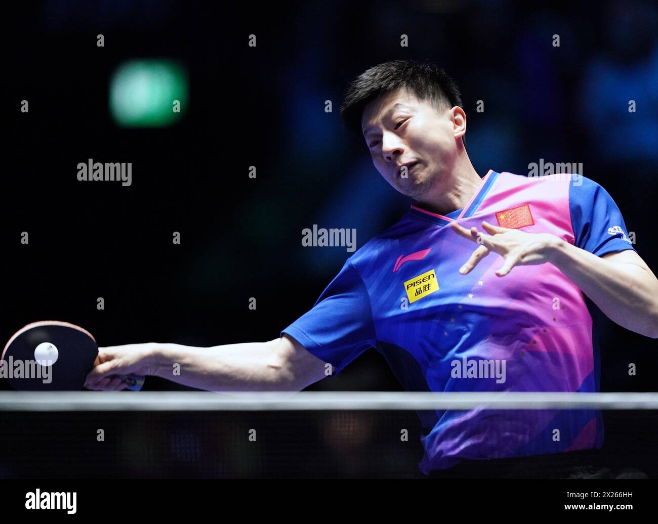 Macao, China. 20th Apr, 2024. Ma Long of China hits a return during the ...