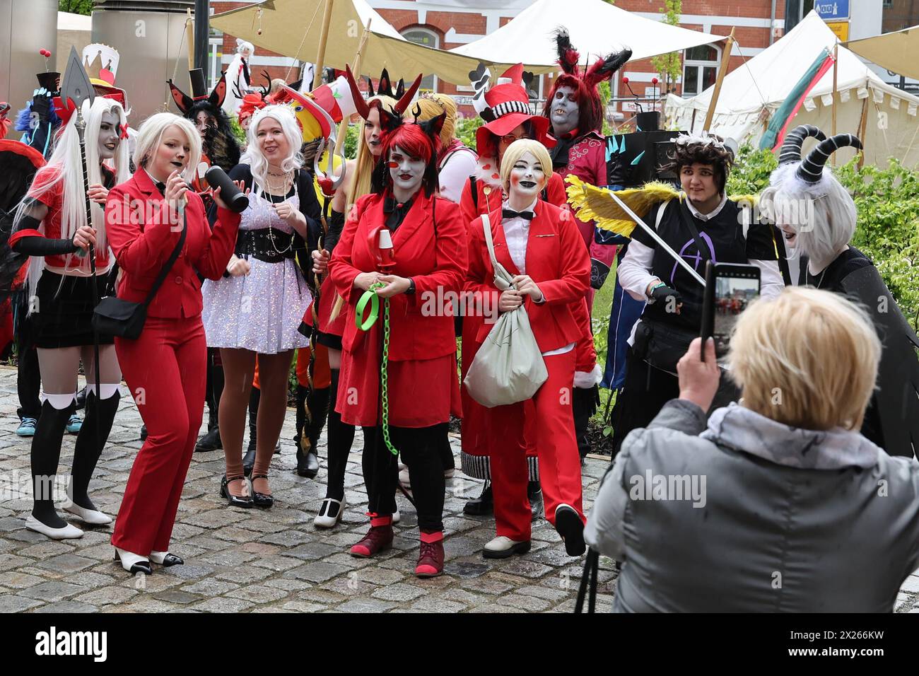 20 April 2024, Thuringia, Jena: Visitors to the "JenaCon" comic and ...