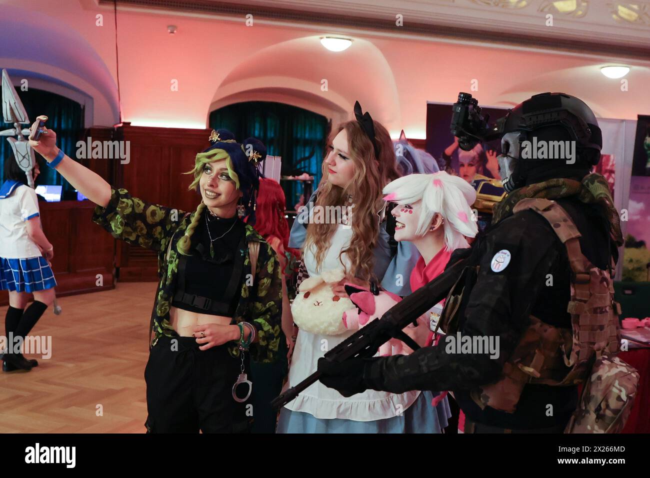 20 April 2024, Thuringia, Jena: Visitors to the "JenaCon" comic and ...
