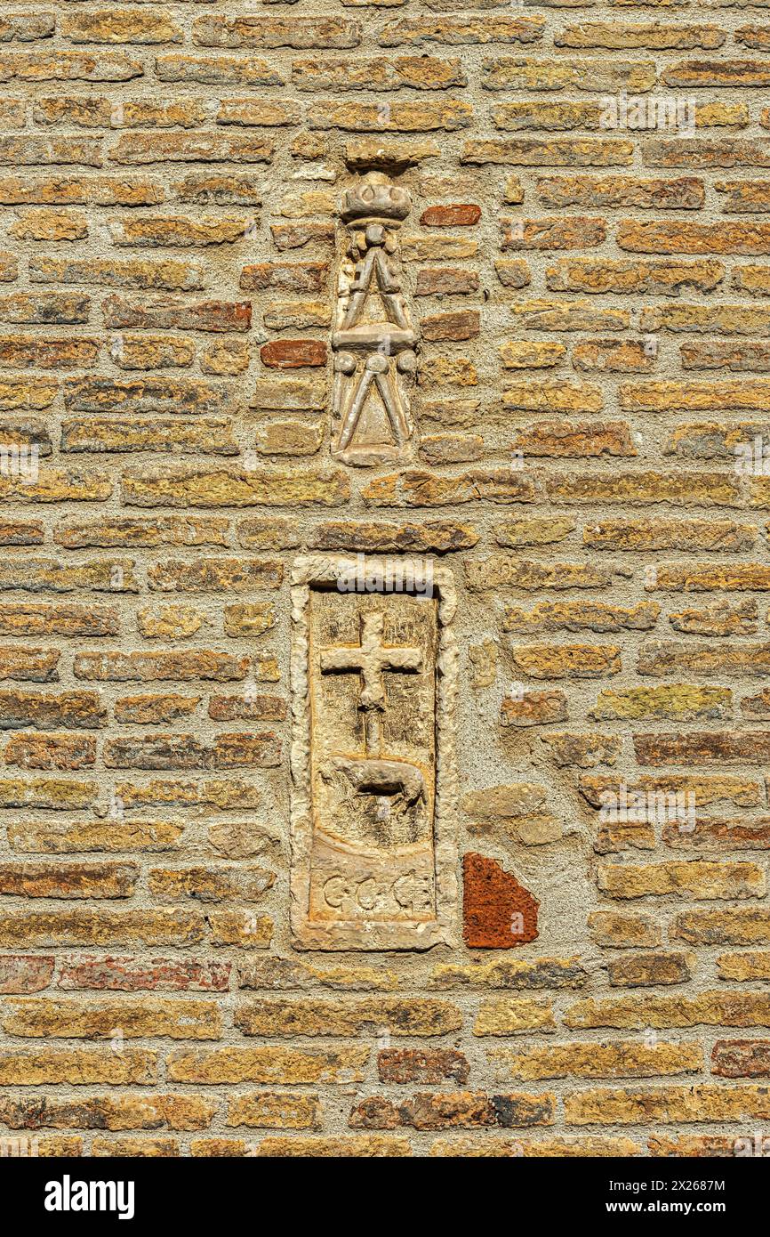 Medieval decorative elements inserted within the external wall texture ...