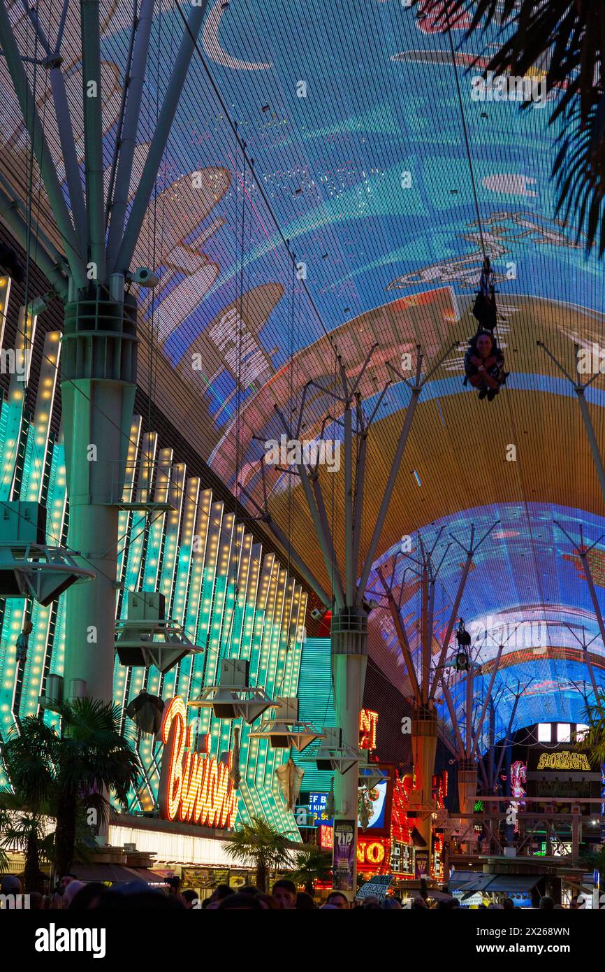 Las Vegas, Nevada. Fremont Street. Two Zip Line Riders on the Zoomline ...