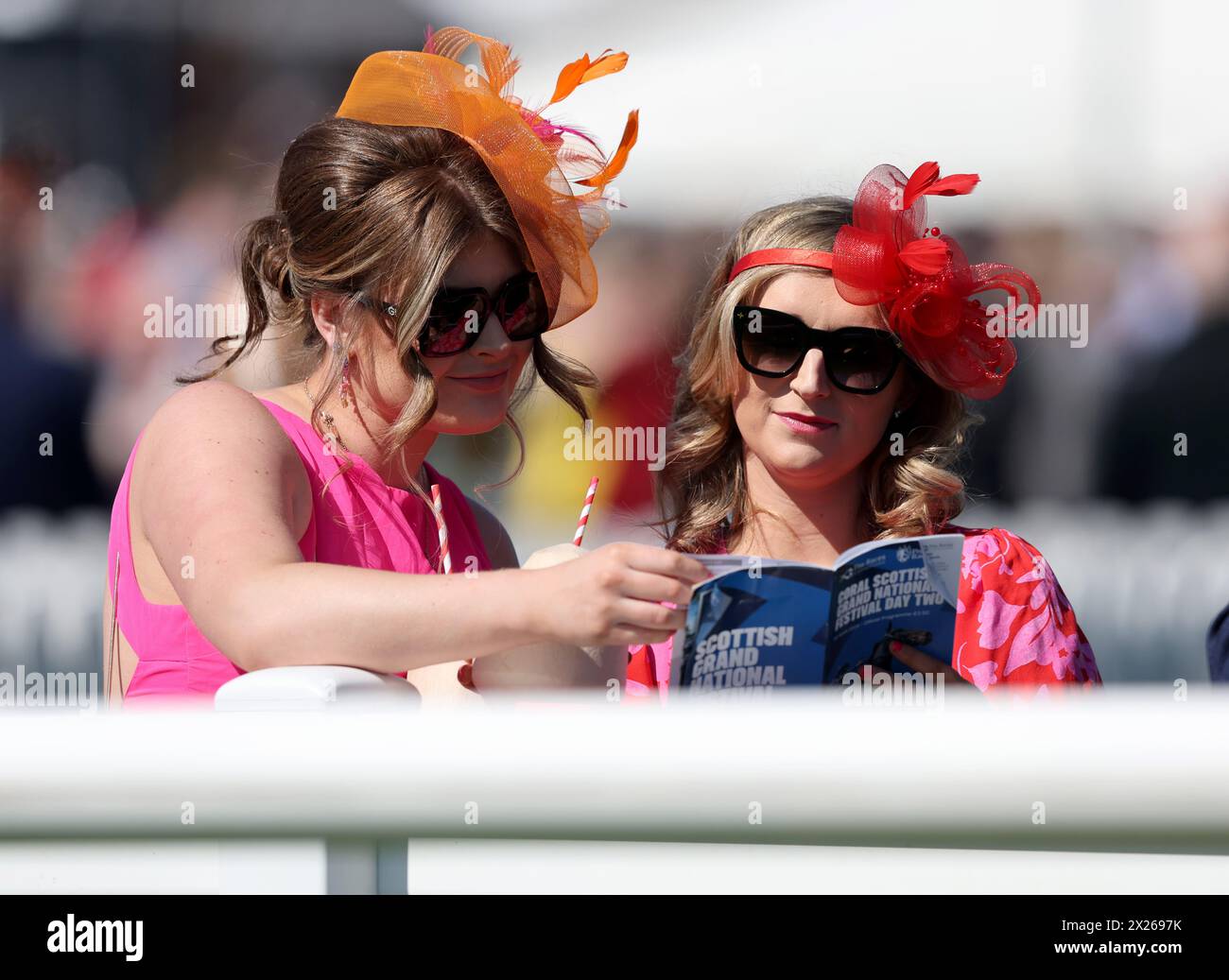 A general view of racegoers enjoying the weather during the Coral ...