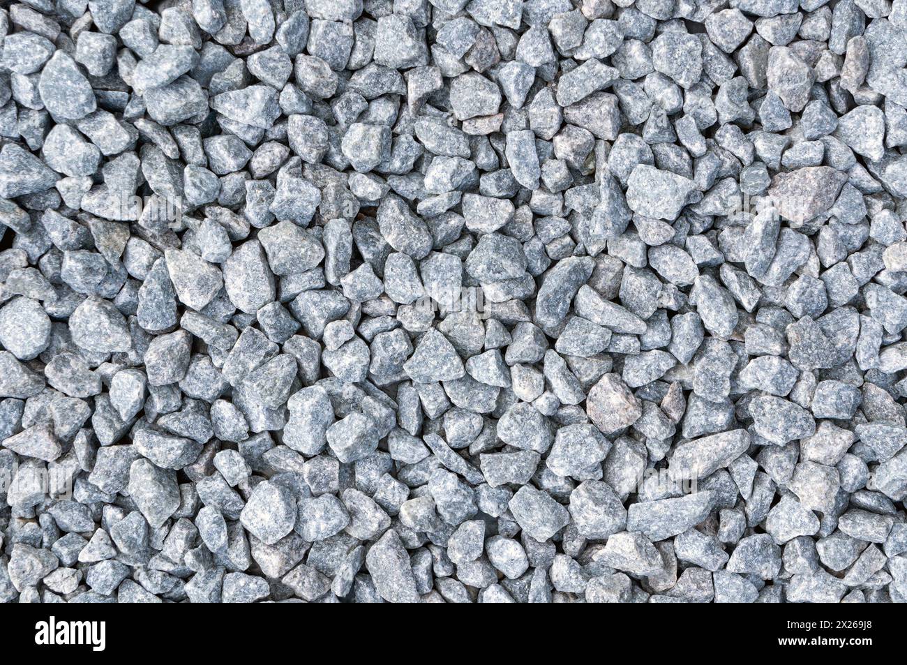 Close-up of a textured. Coarse gravel background. A durable building ...