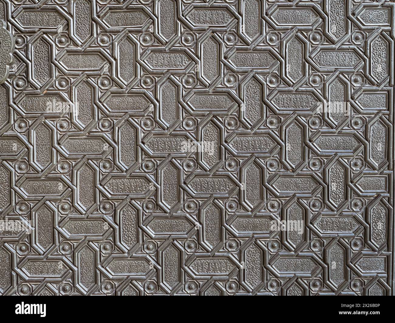 Metal door with Islamic patterns and Arabic calligraphy of the 16th ...