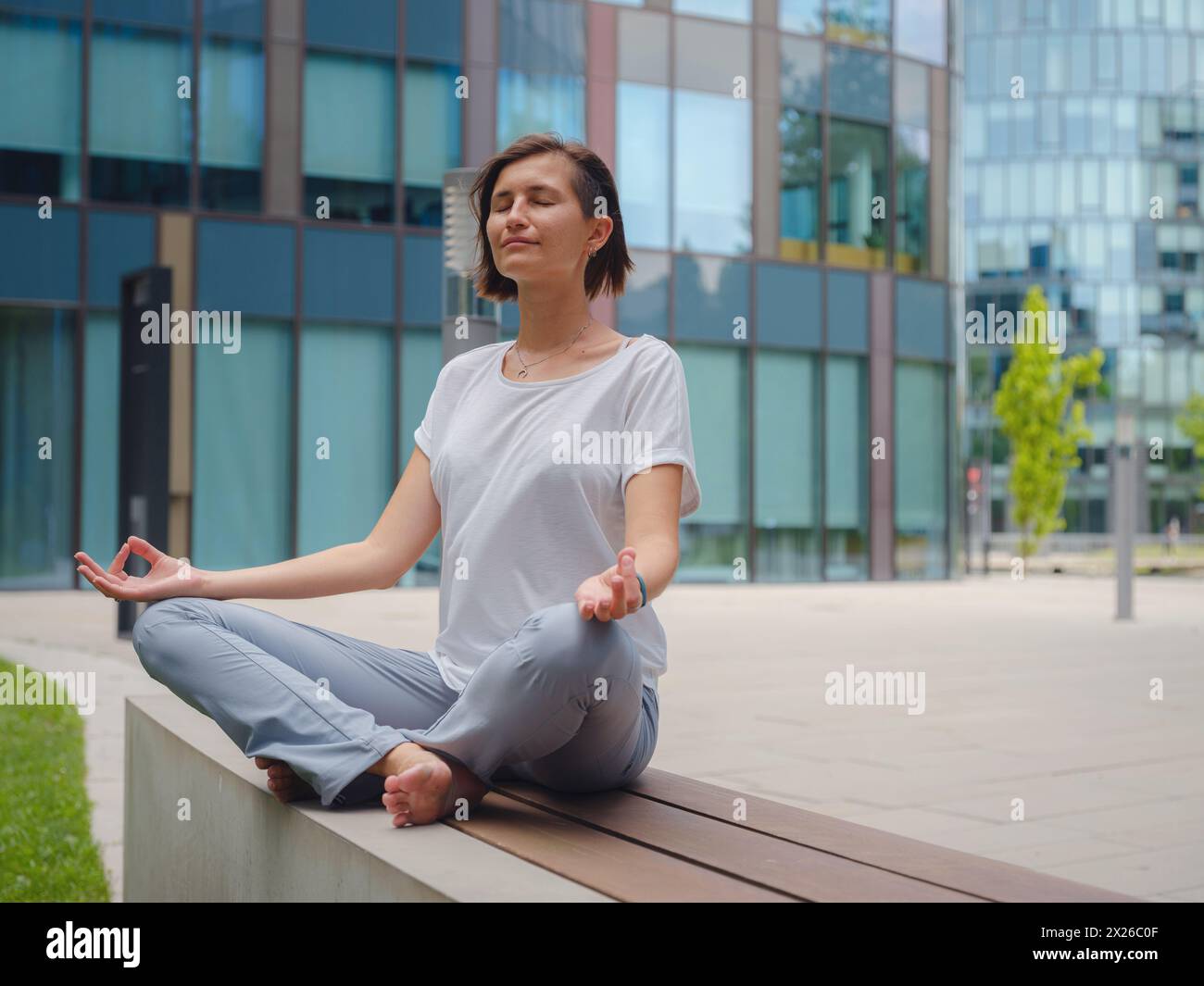 De-stress, unwind idea. peaceful female freelance employee practicing ...