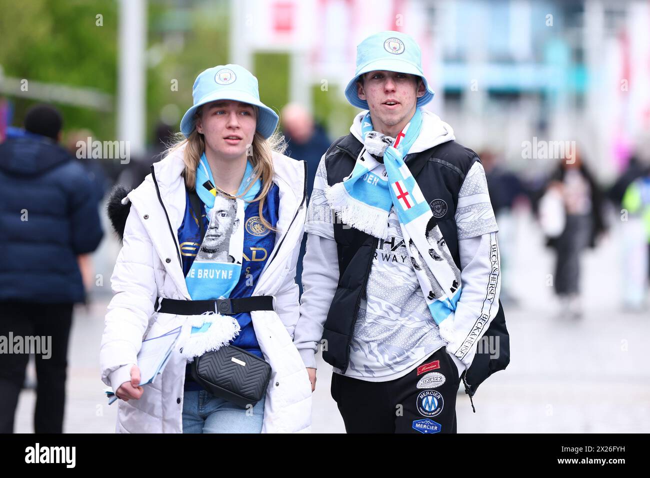 Manchester city fans arrive at the stadium hi-res stock photography and ...