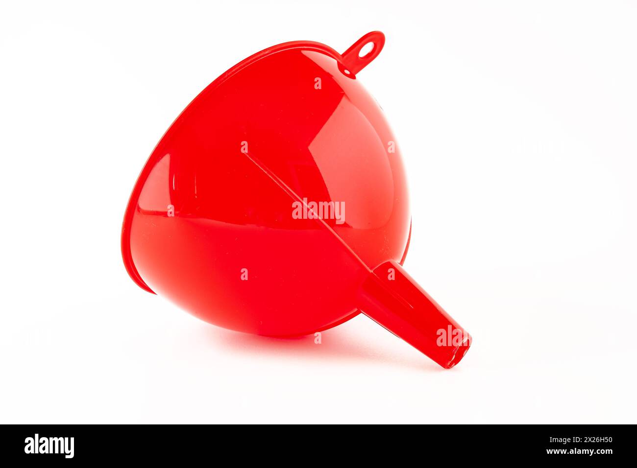 Red plastic funnel isolated on white background Stock Photo - Alamy