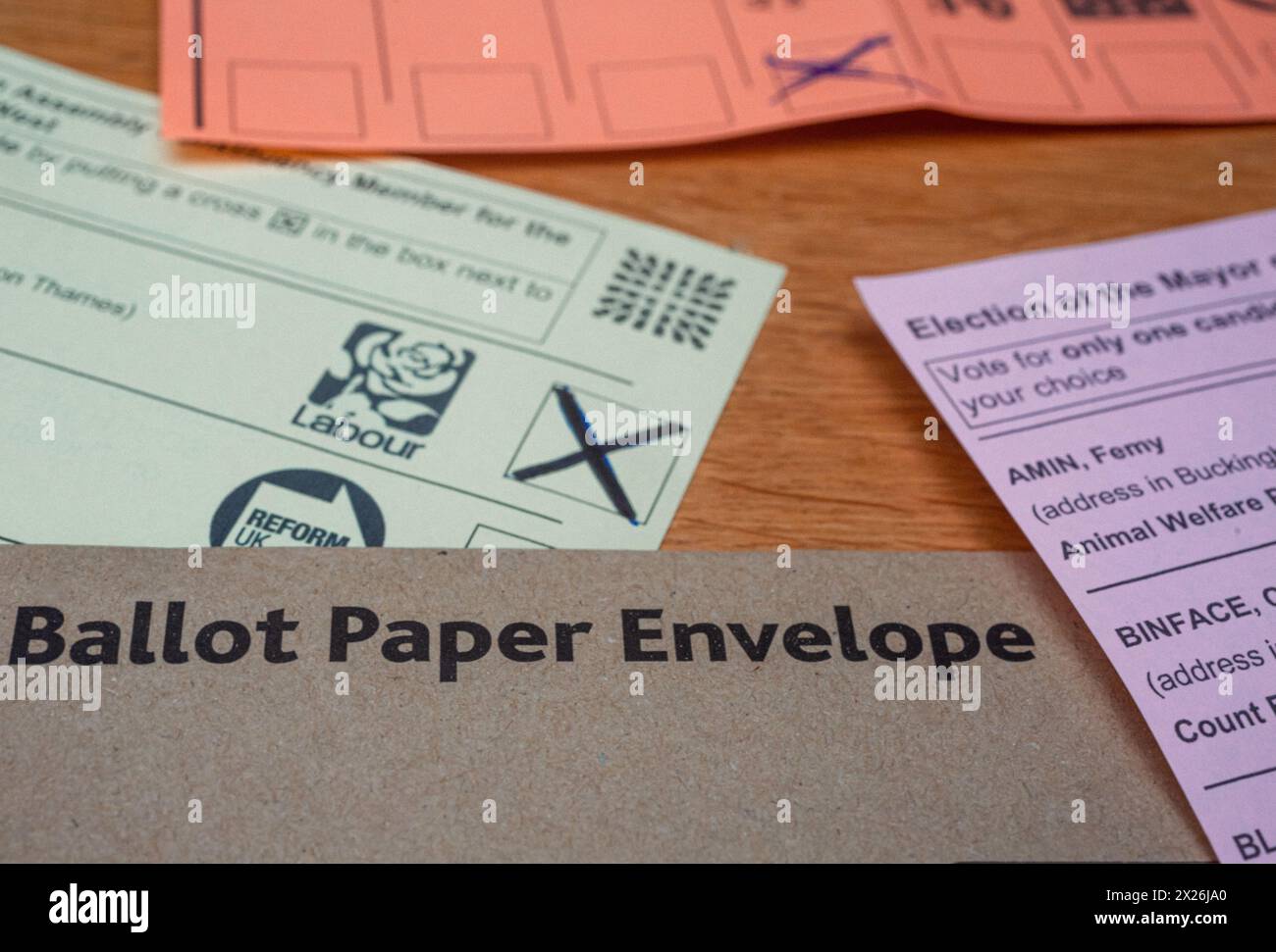 London , United Kingdom , 20.04.2024 , Completing a postal vote ballot ...