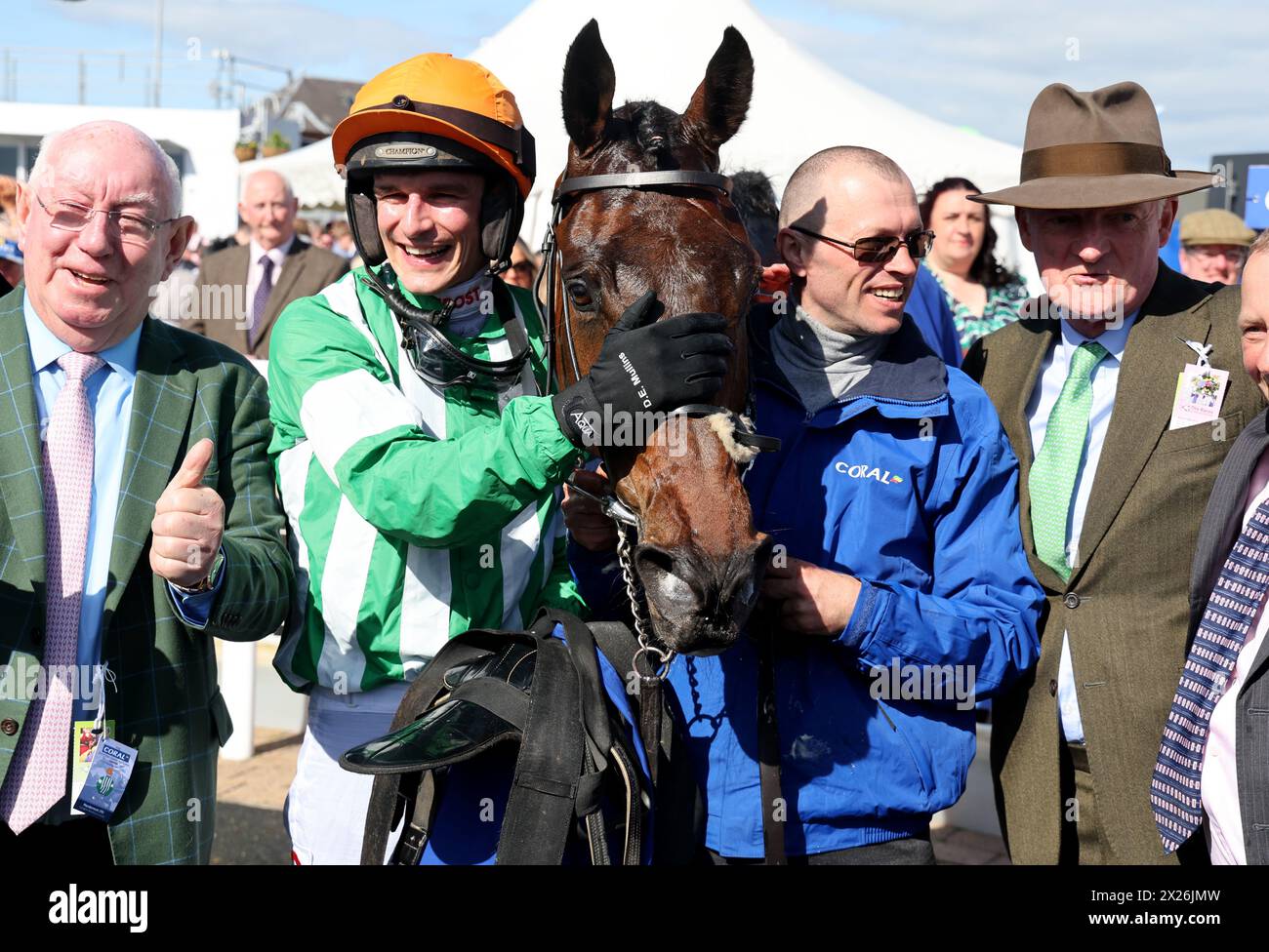 Winning horse Macdermott with jockey Danny Mullins (second left) and ...