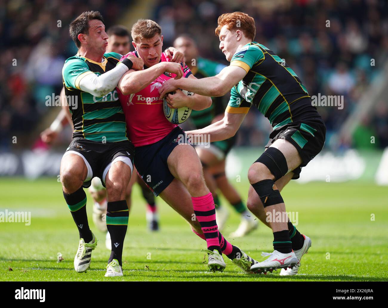 Leicester Tigers' Jack van Poortvliet is tackled by Northampton Saints ...