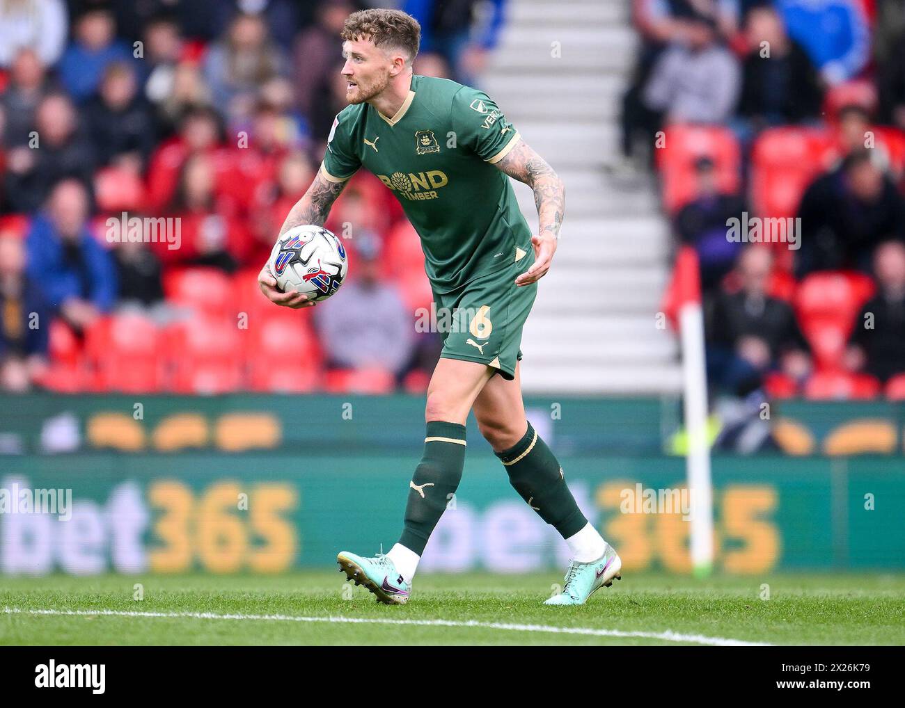 Dan Scarr of Plymouth Argyle in action during the Sky Bet Championship ...