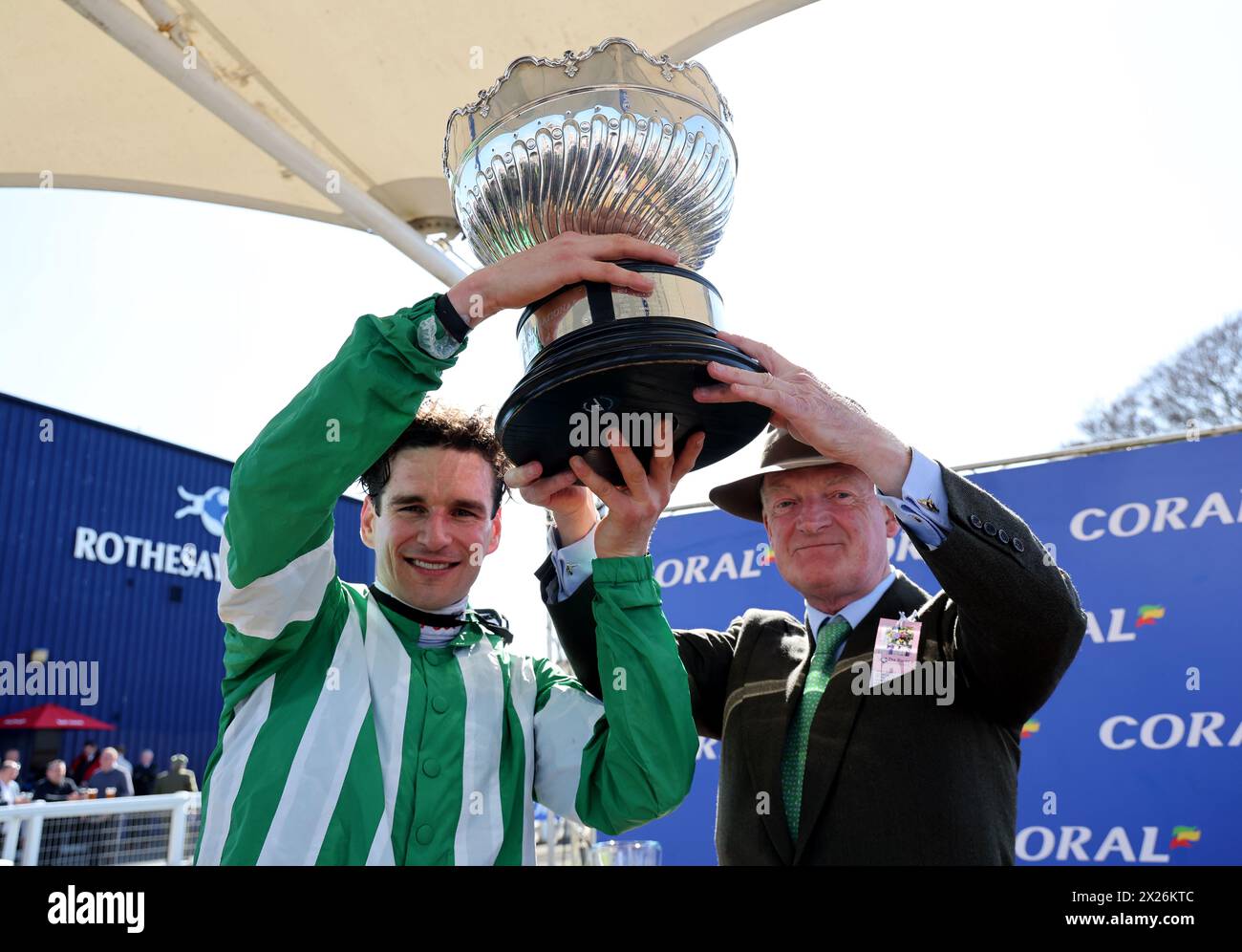 Jockey Danny Mullins and trainer Willie Mullins with the trophy after ...