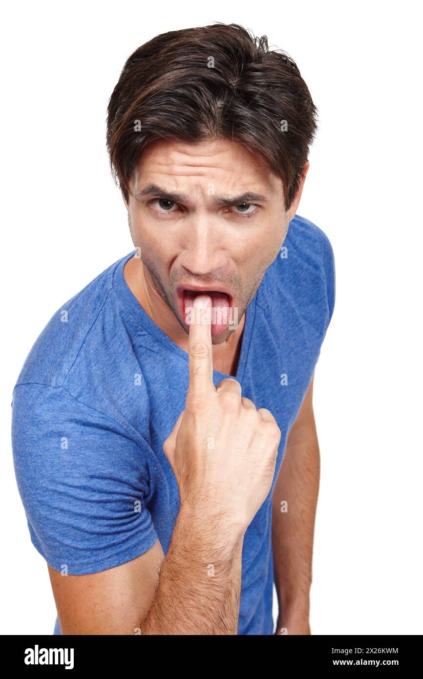 Man, studio and gesture with finger for nausea or disgust, expression ...