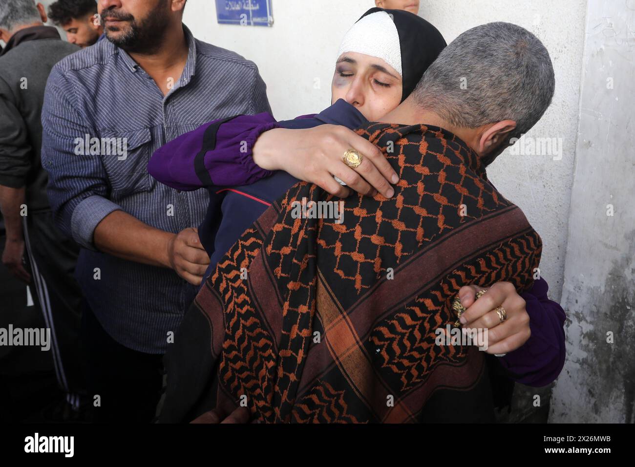 Rafah, Gaza. 19th Apr, 2024. Palestinians mourns relatives killed in Israeli bombing at Al-najar ...
