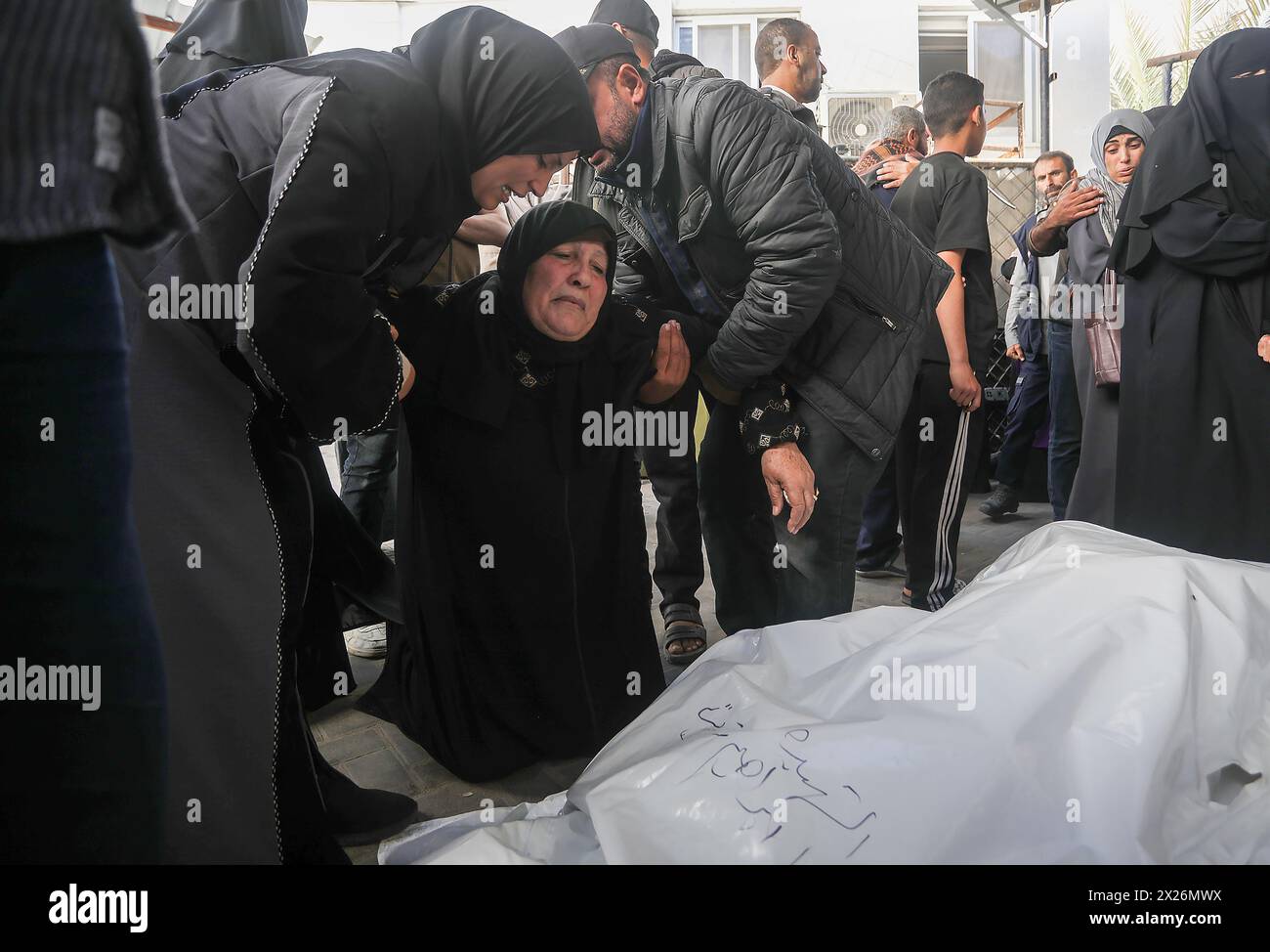 Rafah, Gaza. 19th Apr, 2024. Palestinians mourns relatives killed in Israeli bombing at Al-najar ...