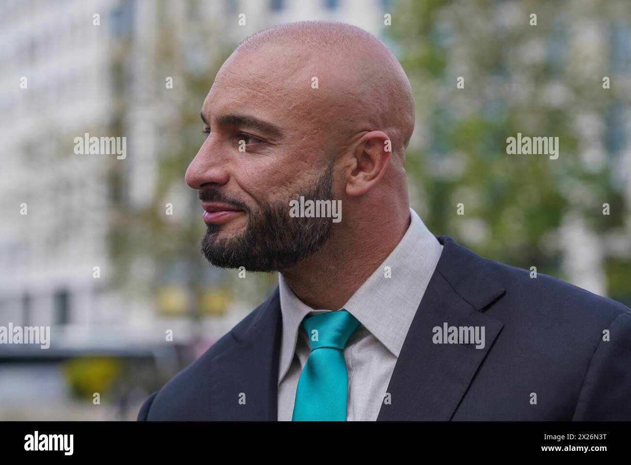 London 20 April 2024 . Independent candidate Andreas Michli in front of ...