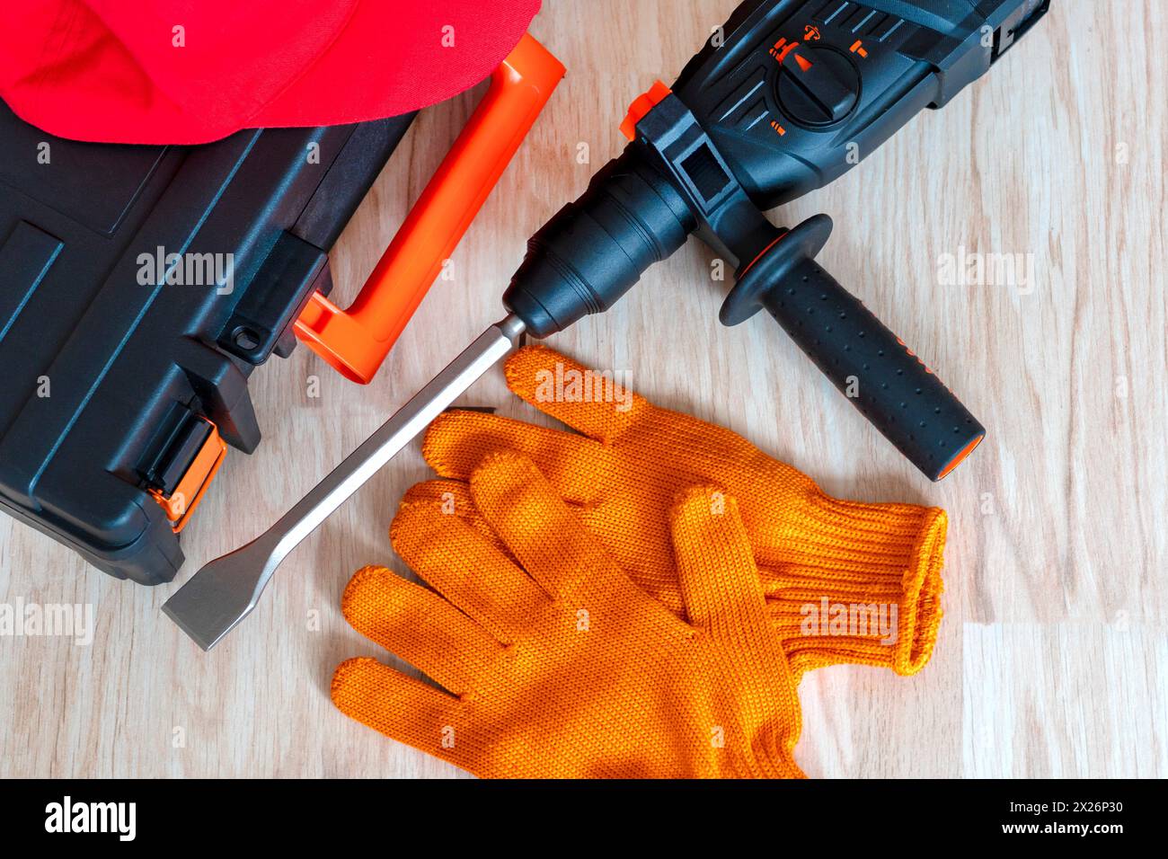 Top view of Working tools.rotary hammer, tool box, work cap, gloves ...