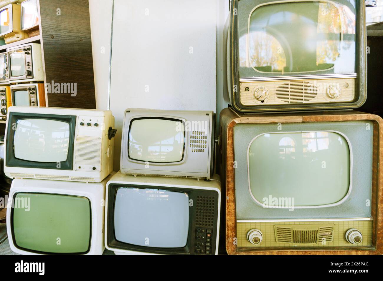 Many retro television. vintage old TV is colorful multi-row. Seeing the ...