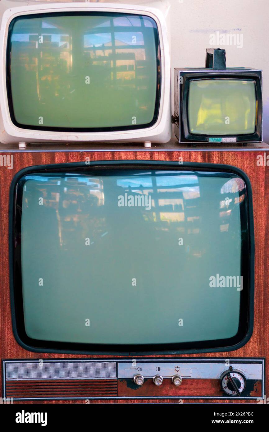 Many retro television. vintage old TV is colorful multi-row. Seeing the ...
