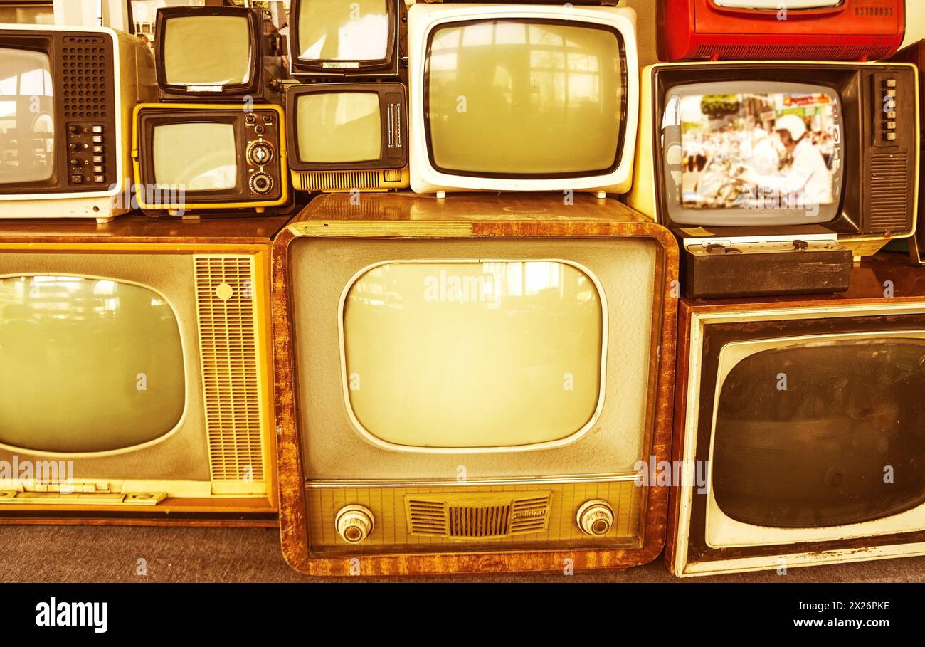 Many retro television. vintage old TV is colorful multi-row. Seeing the ...