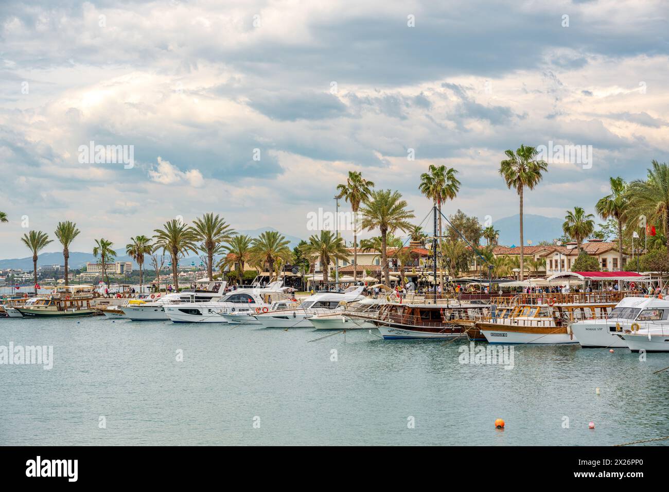 Side, Manavgat, Turkey – April 9, 2024: Sightseeing boats and town ...