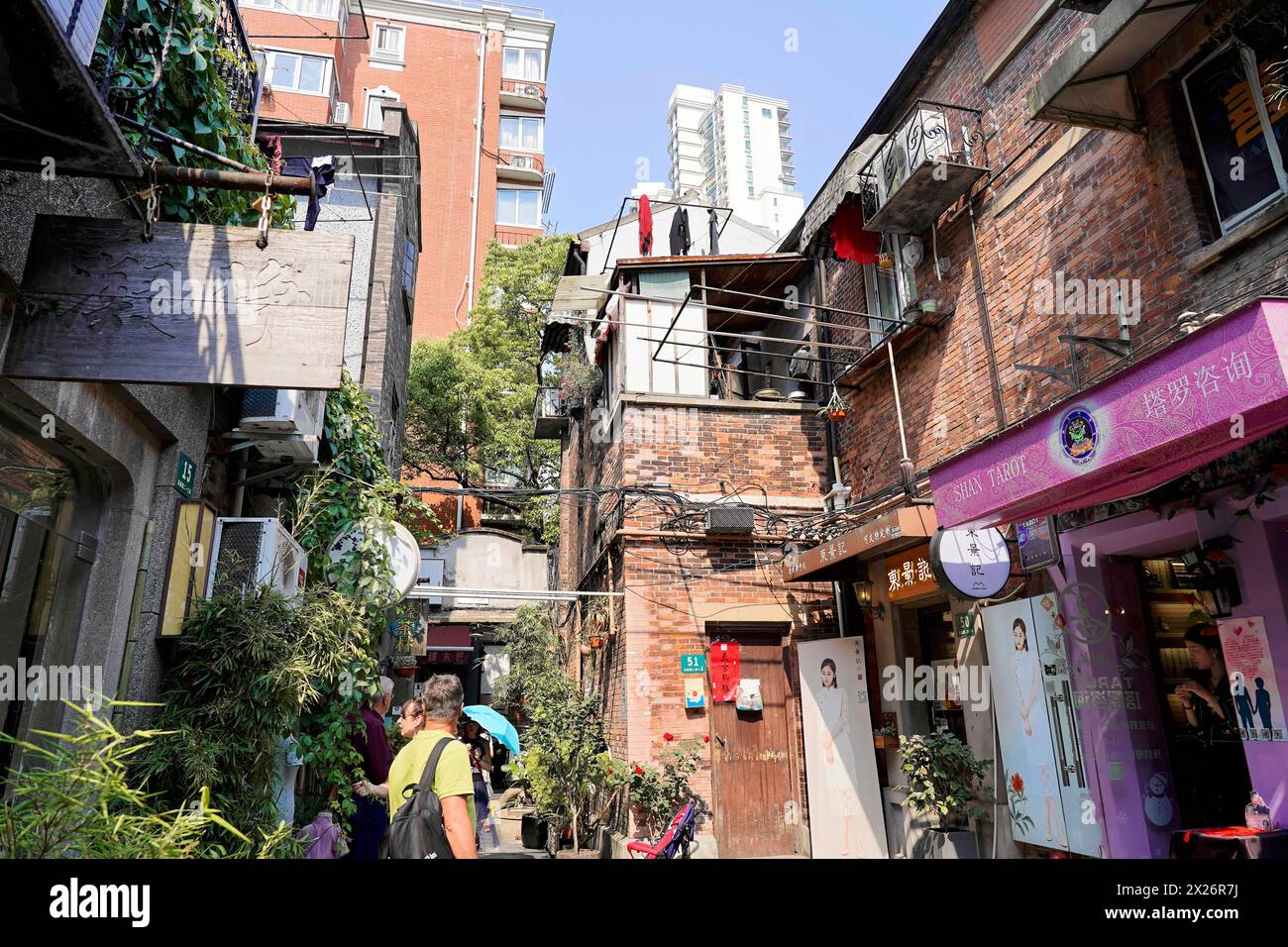 Stroll through the restored Tianzifang neighbourhood, A narrow alley ...