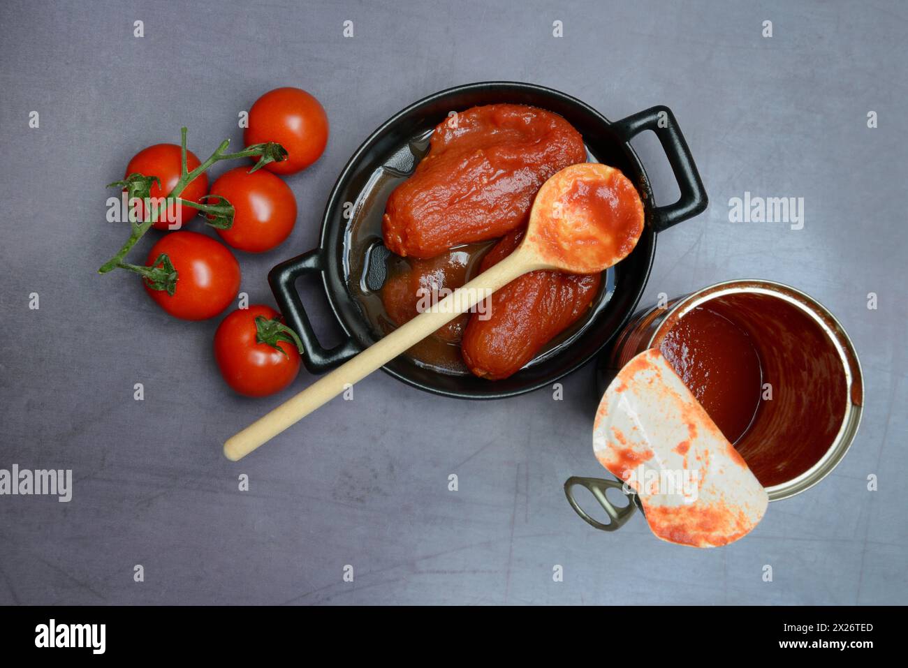 Whole tinned tomatoes in a pot, tomatoes and tins Stock Photo - Alamy