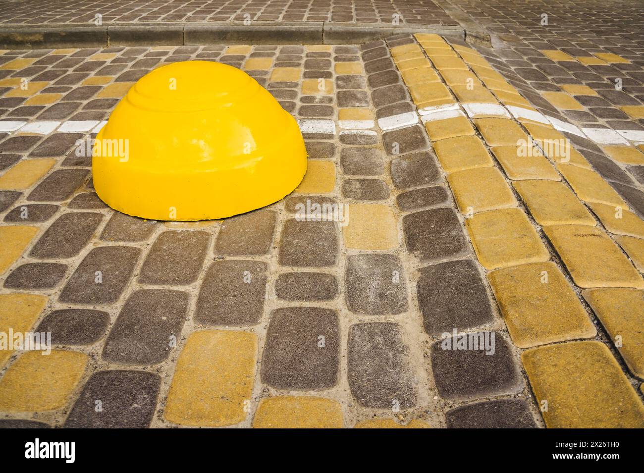concrete hemispheres prohibiting parking barrier. The drive and the ...