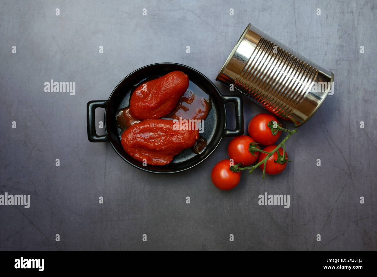 Whole tinned tomatoes in a pot, tomatoes and tins Stock Photo - Alamy