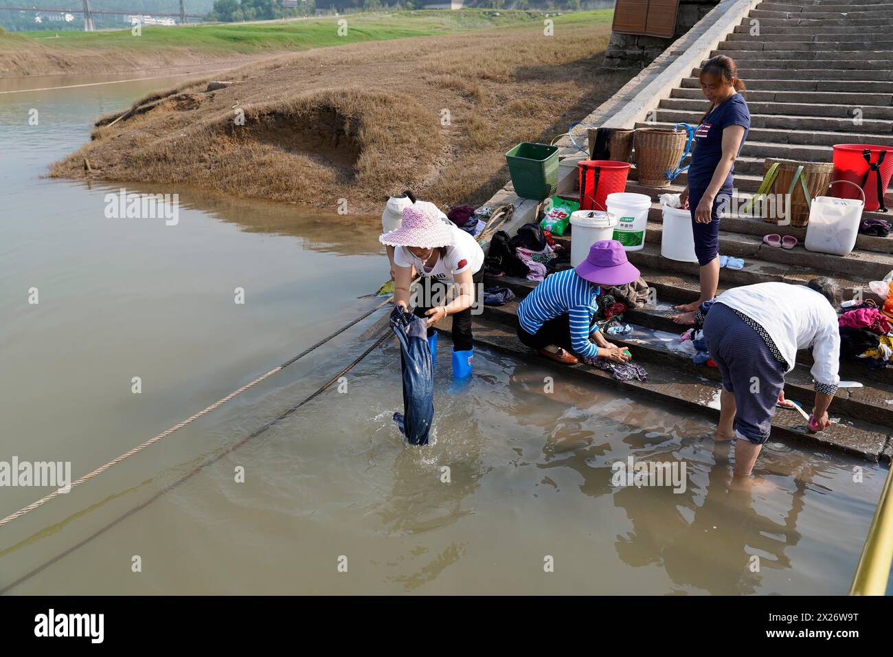Women washing clothes in the Yangtze River, Yichang, Hubel Province ...