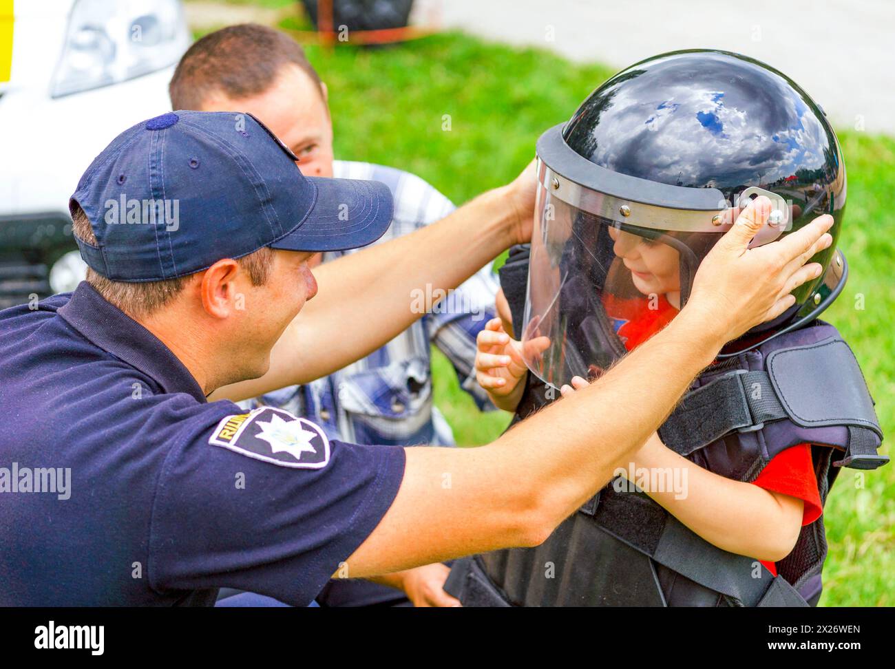 The child in a police helmet. good attitude of police officers to ...