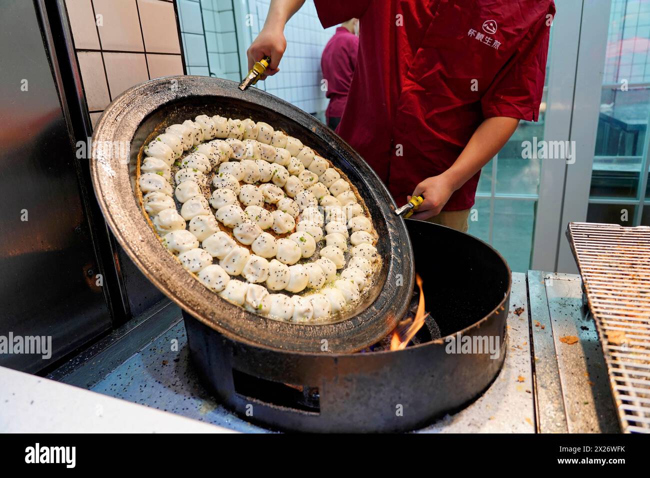Stroll in Chongqing, Chongqing Province, China, Asia, A cook prepares ...