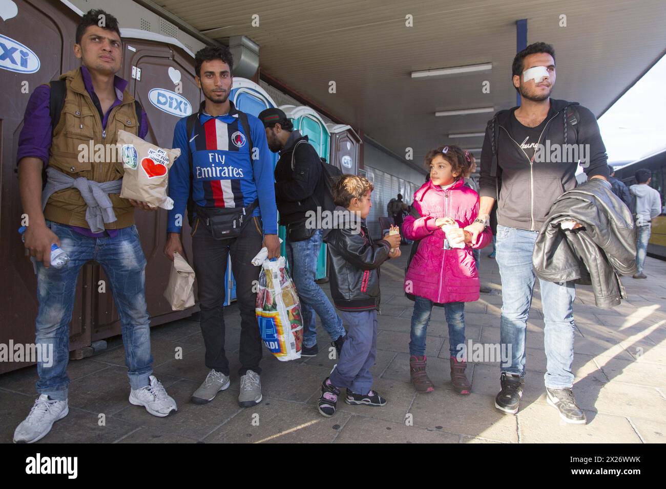 Syrian refugees have arrived at Schoenefeld station on a special train ...