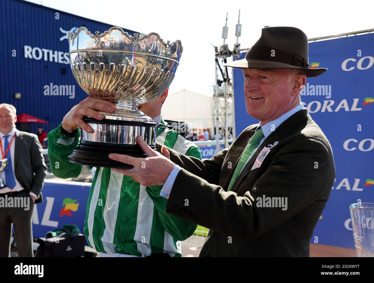 Jockey Danny Mullins and trainer Willie Mullins with the trophy after ...