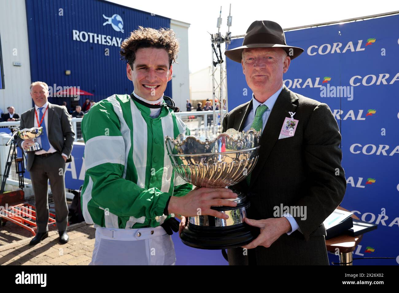 Jockey Danny Mullins and trainer Willie Mullins with the trophy after ...