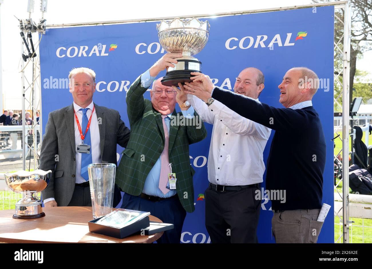 Macdermott's winning connections with the trophy after their horse won ...