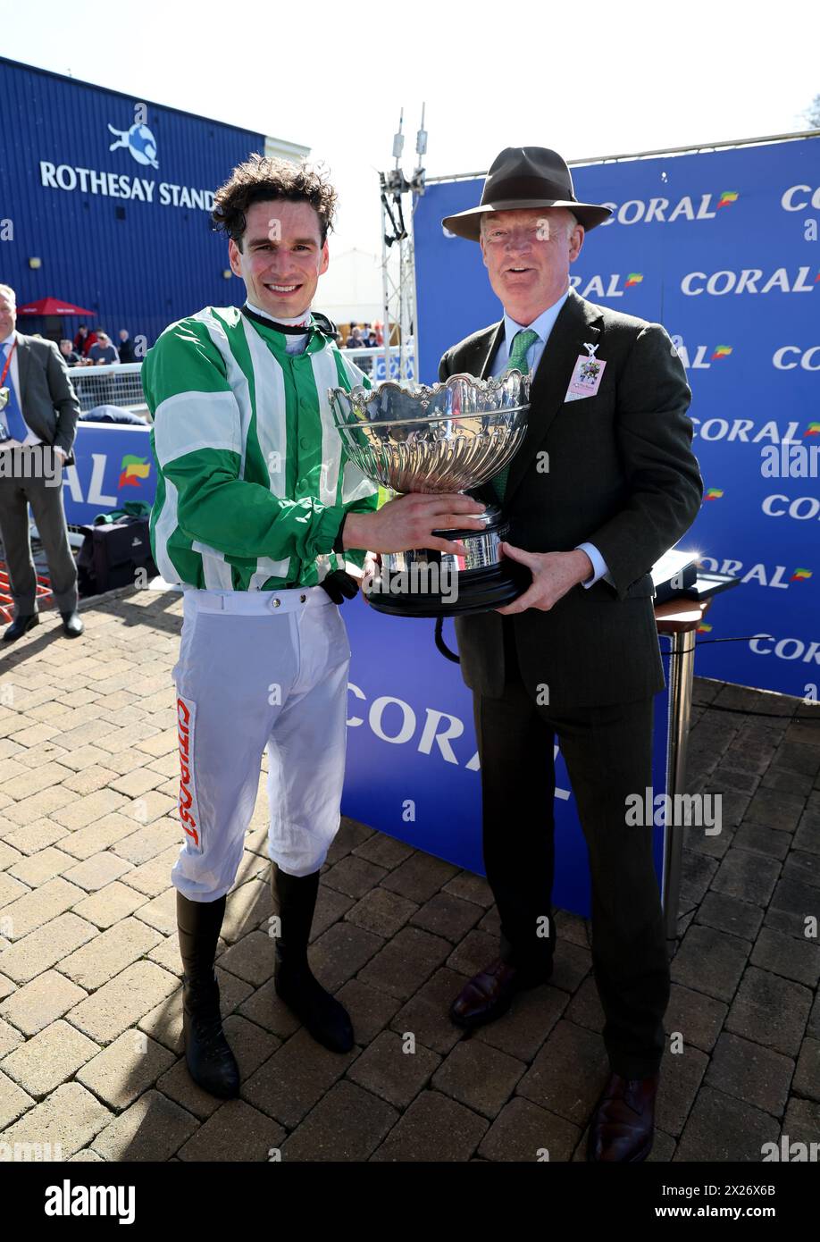 Jockey Danny Mullins and trainer Willie Mullins with the trophy after ...