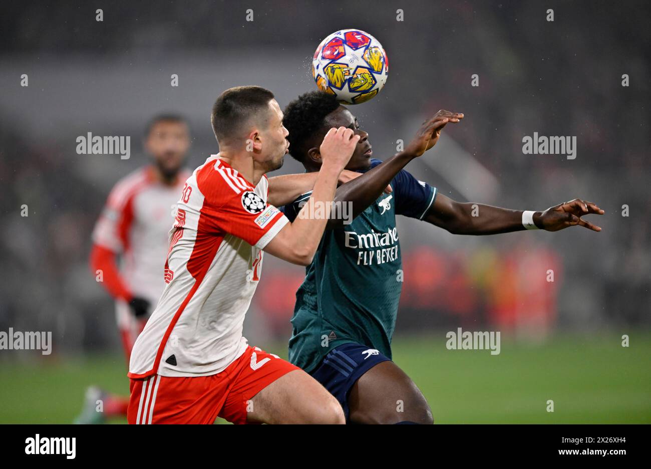 Raphael Guerreiro FC Bayern Muenchen FCB (22) v Bukayo Saka FC Arsenal ...