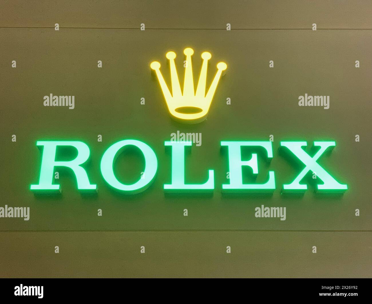Rolex Illuminated on a Wall in Switzerland Stock Photo - Alamy