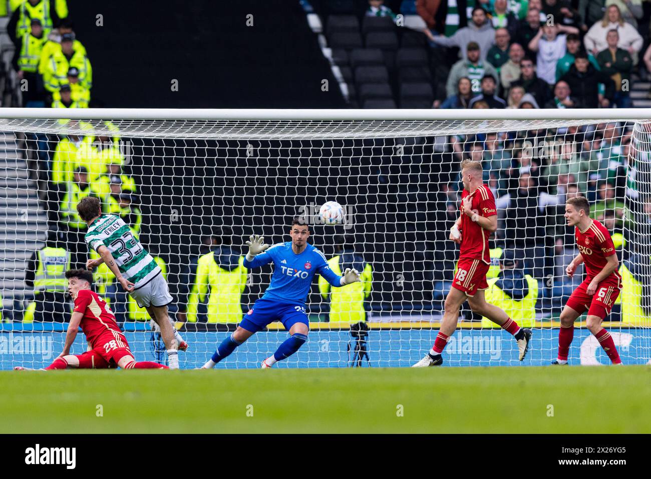 Glasgow, Scotland. 20 April 2024. Matt O’Riley (33 - Celtic) scores to put Celtic ahead in extra ...