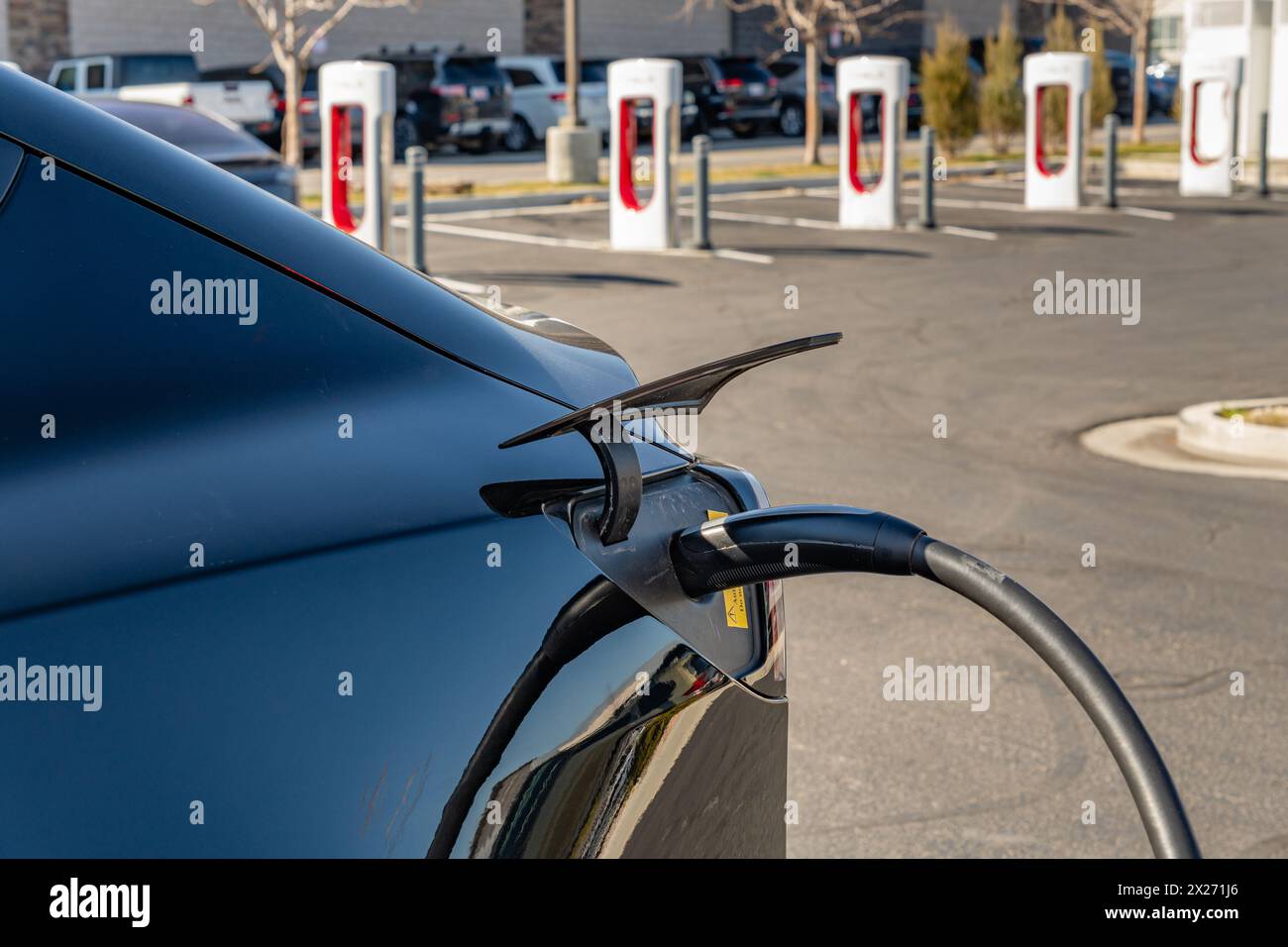 Salt Lake City, UT, US-February 25, 2024: Black Tesla electric vehicle ...