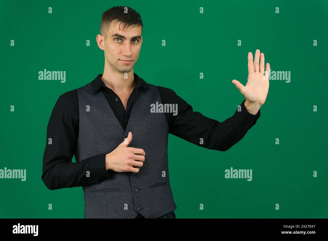 emotions of a handsome man guy on a green background chromakey close-up ... emotions of a handsome man guy on a green background chromakey close-up ...