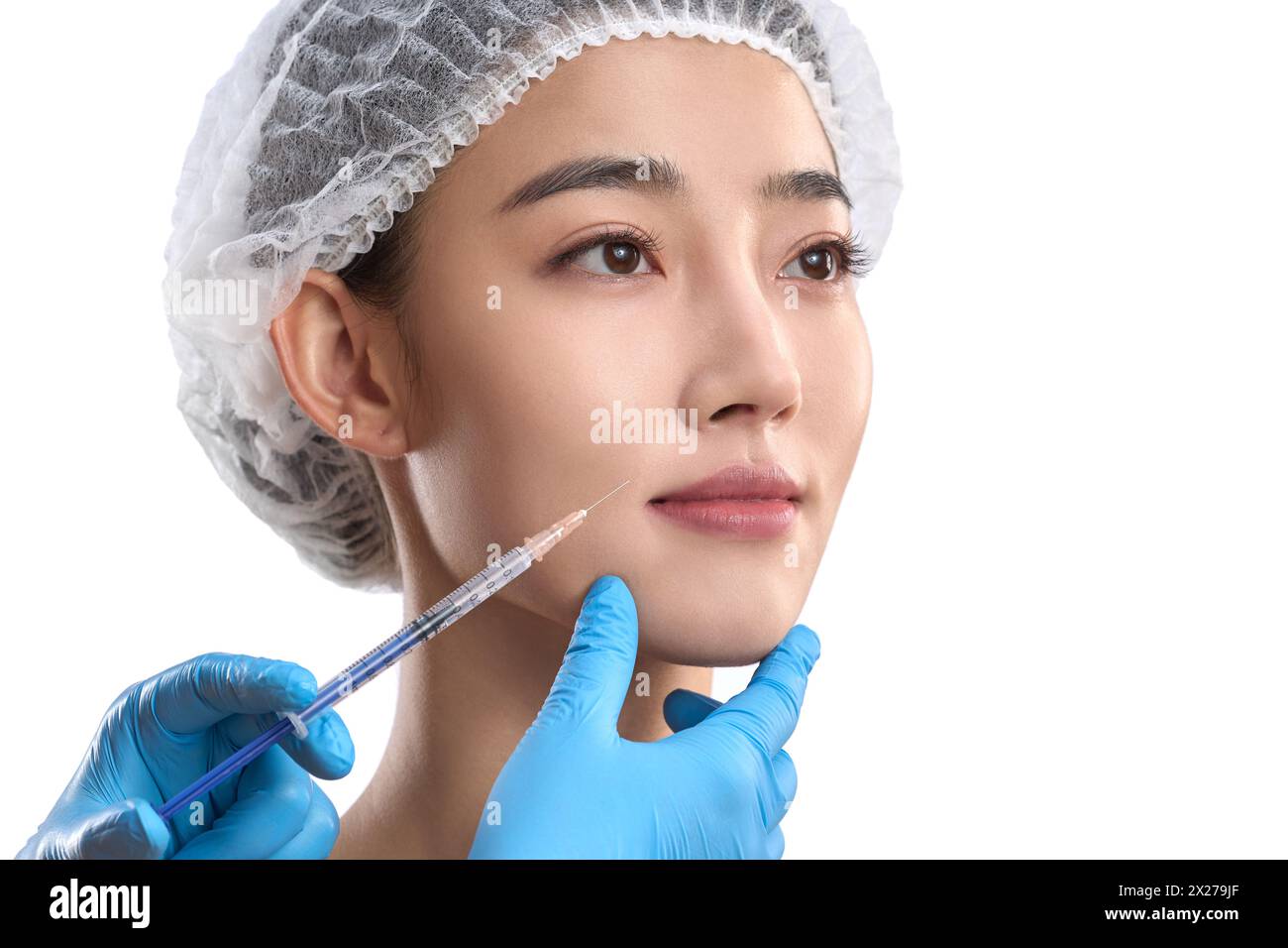 Young women undergoing facial injections in medical beauty plastic ...