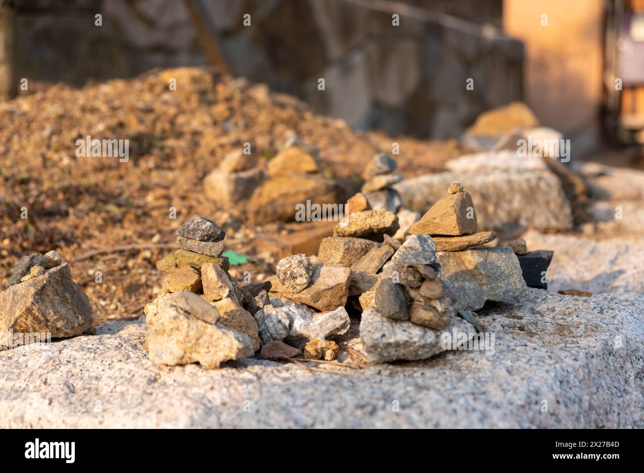 Stone pile in a temple. It is believed that stacking the stones will ...