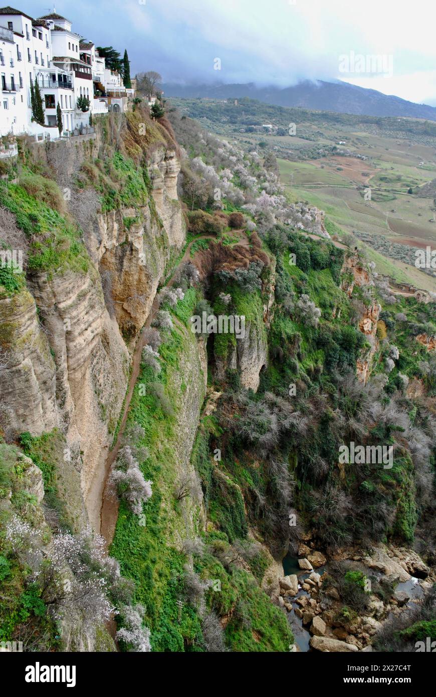 Houses on the edge of El Tajo canyon in Ernest Hemingways Ronda in ...