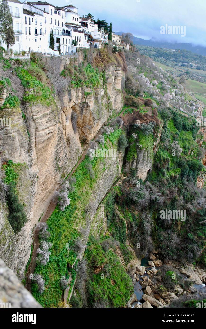 Houses on the edge of El Tajo canyon in Ernest Hemingways Ronda in ...