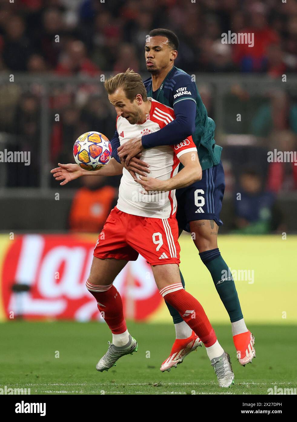 Harry Kane of Bayern Muenchen Gabriel Magalhaes of FC Arsenal MUNICH ...